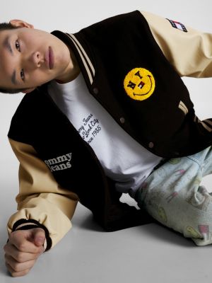 Tommy Jeans X Smiley® Zweifarbige Varsity Jacke Schwarz Tommy Hilfiger